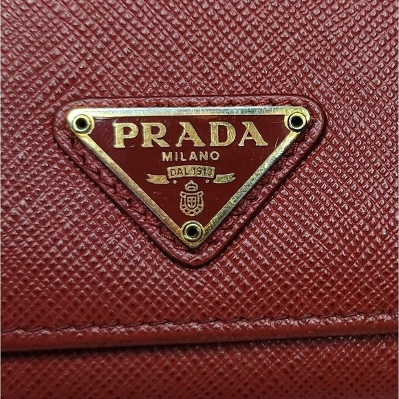 Prada | Bags | Prada Silver Logo Plaque Fold | Poshmark